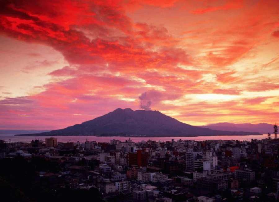 Sakurajima, the active volcano and a Shrine gate which cannot pass under